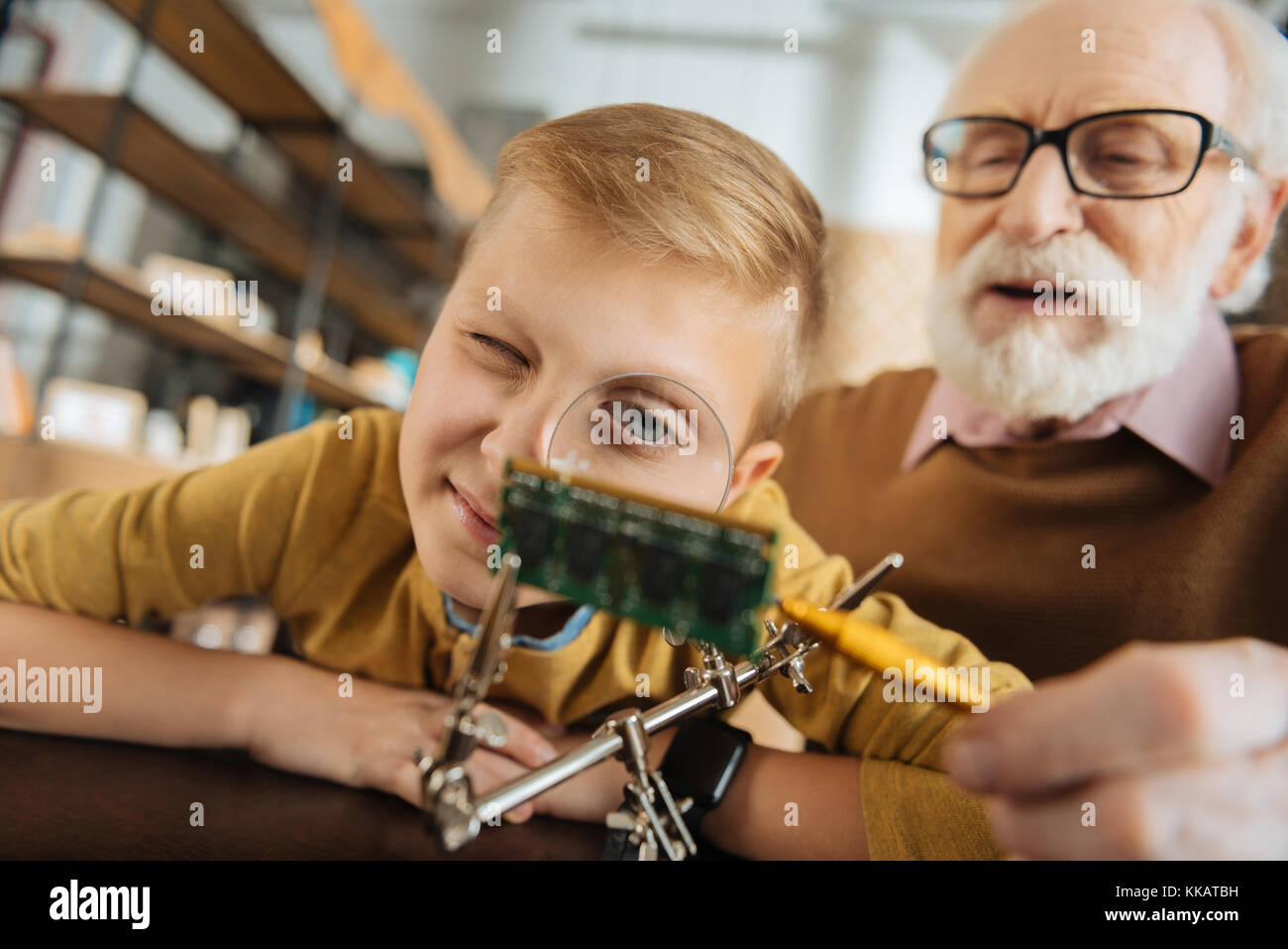 Boy leaning forward hi-res stock photography and images - Alamy