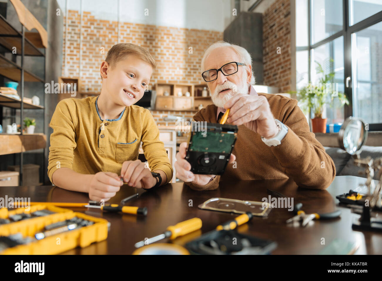 Smart skillful man showing what to do Stock Photo - Alamy