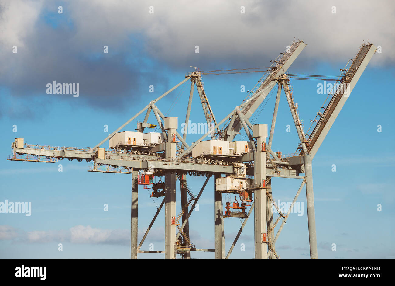 Heavy industrial sea port container cranes Stock Photo - Alamy