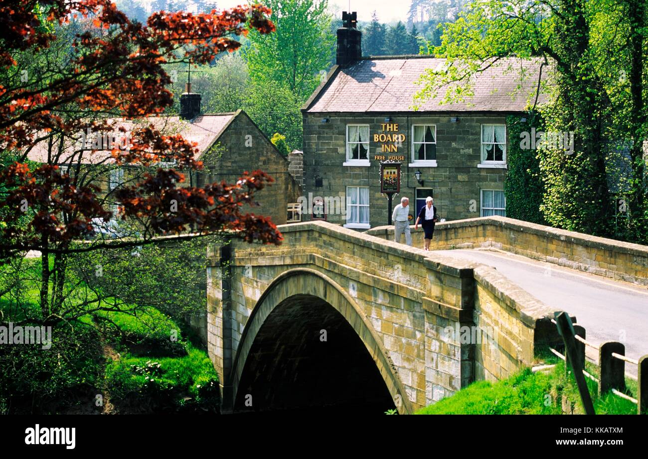 Pub and bridge over River Esk in village of Lealholm in North York ...