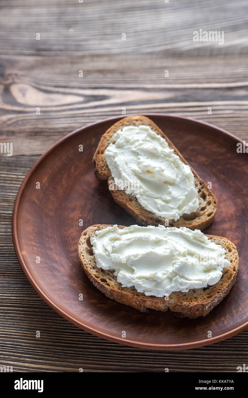 Toasts with cream cheese Stock Photo - Alamy