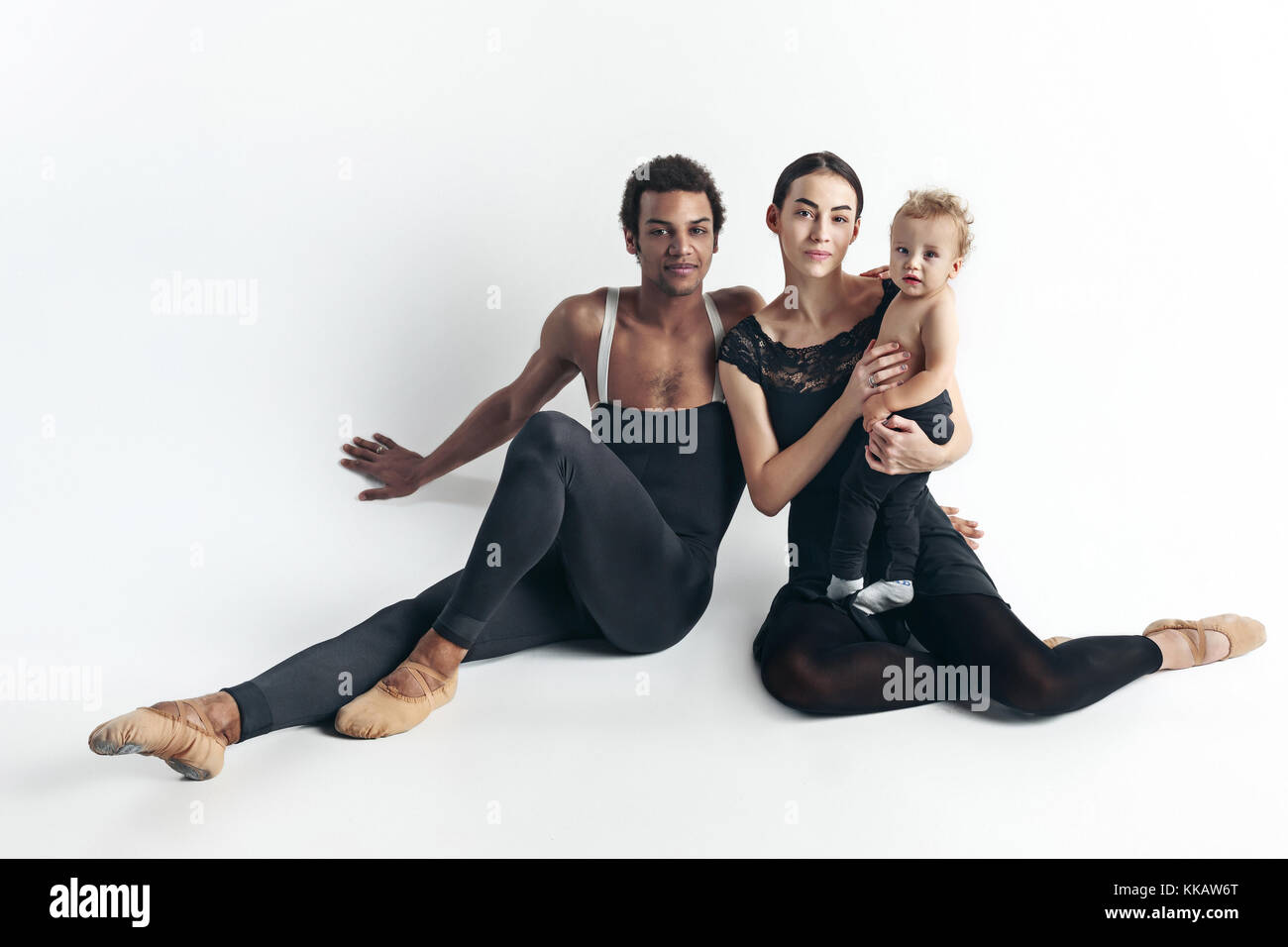 Child acrobat and parent hi-res stock photography and images - Alamy