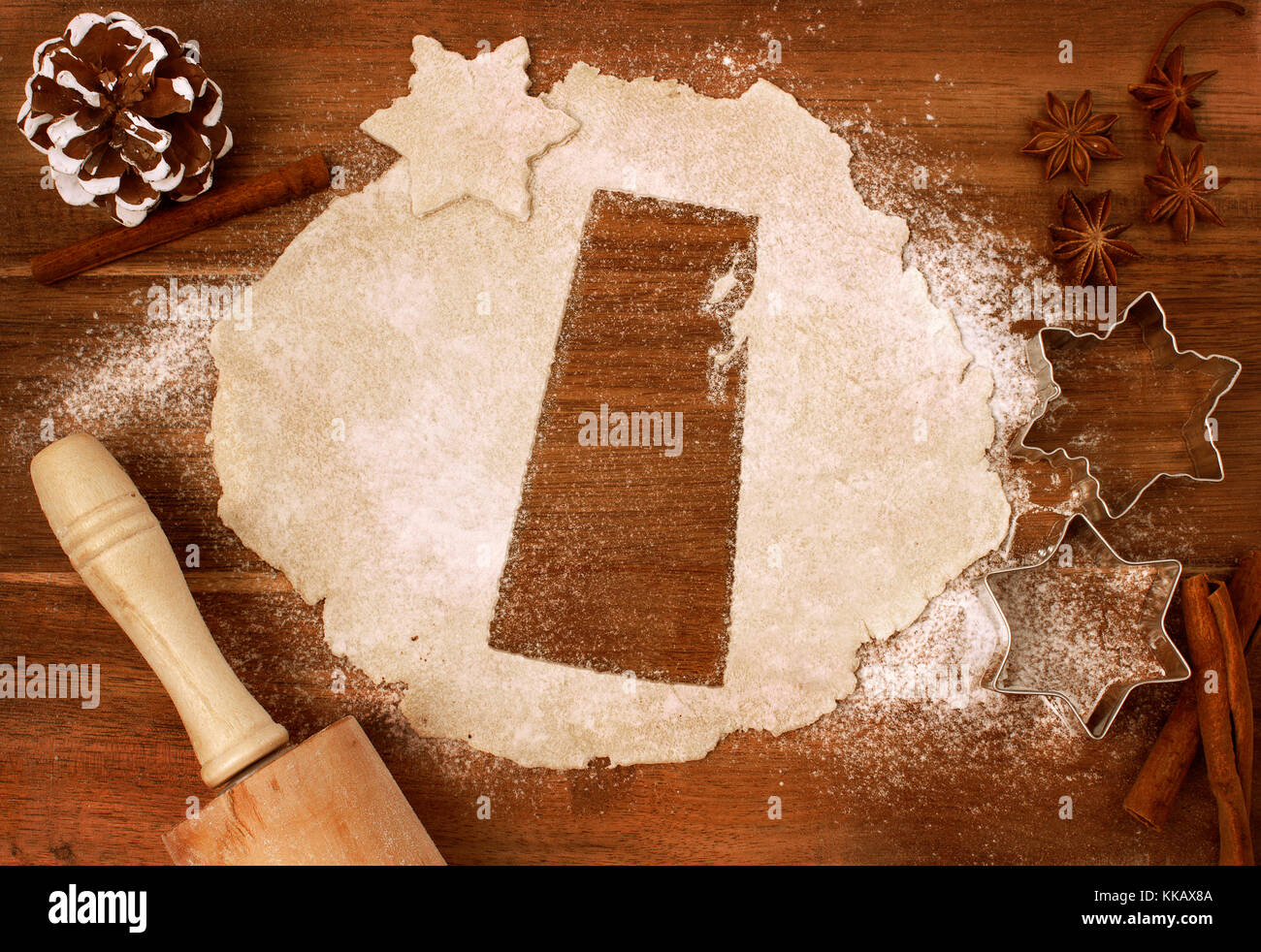 Festive cookie dough with the shape of Saskatchewan cut out (series ...