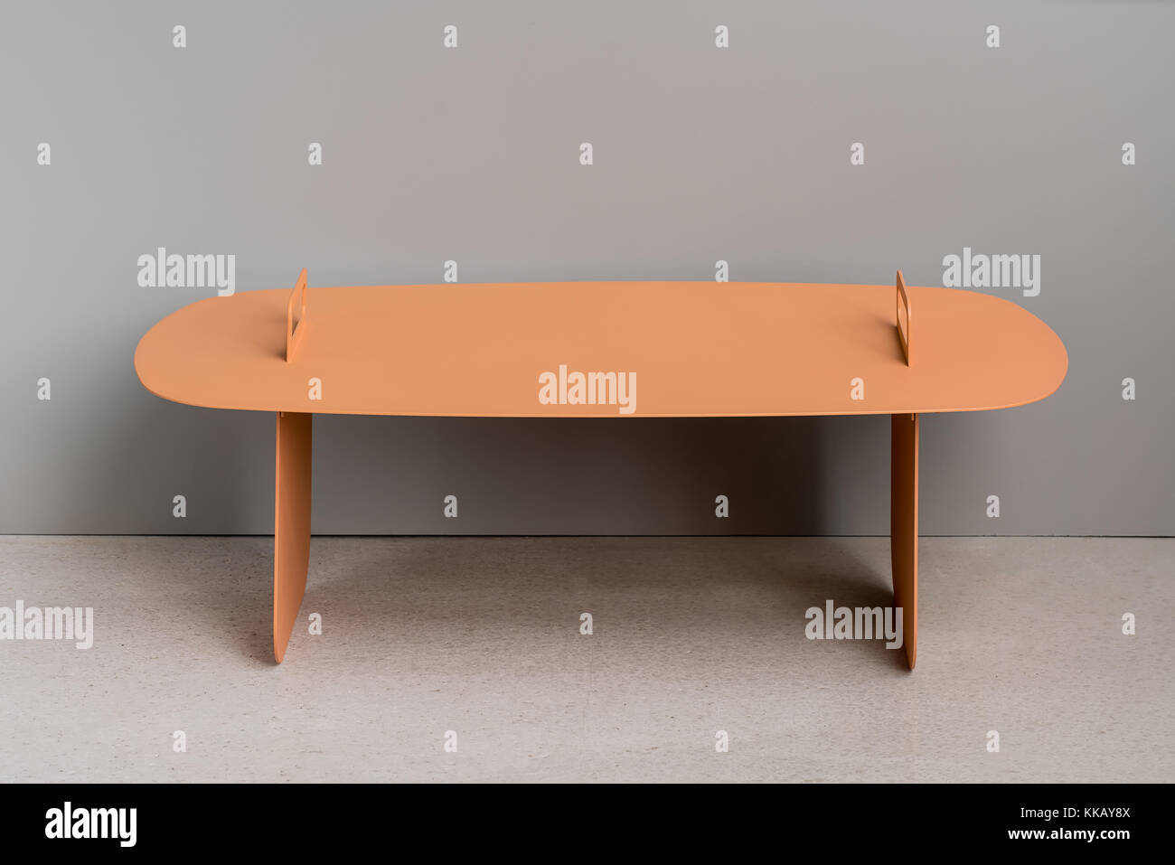 Steel orange table Stock Photo - Alamy