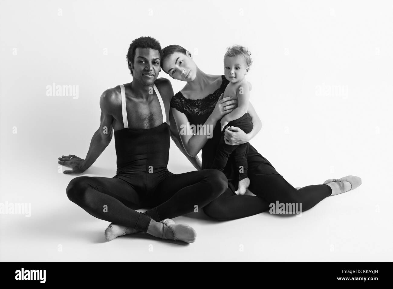 A happy family of ballet dancers on white studio background Stock Photo ...