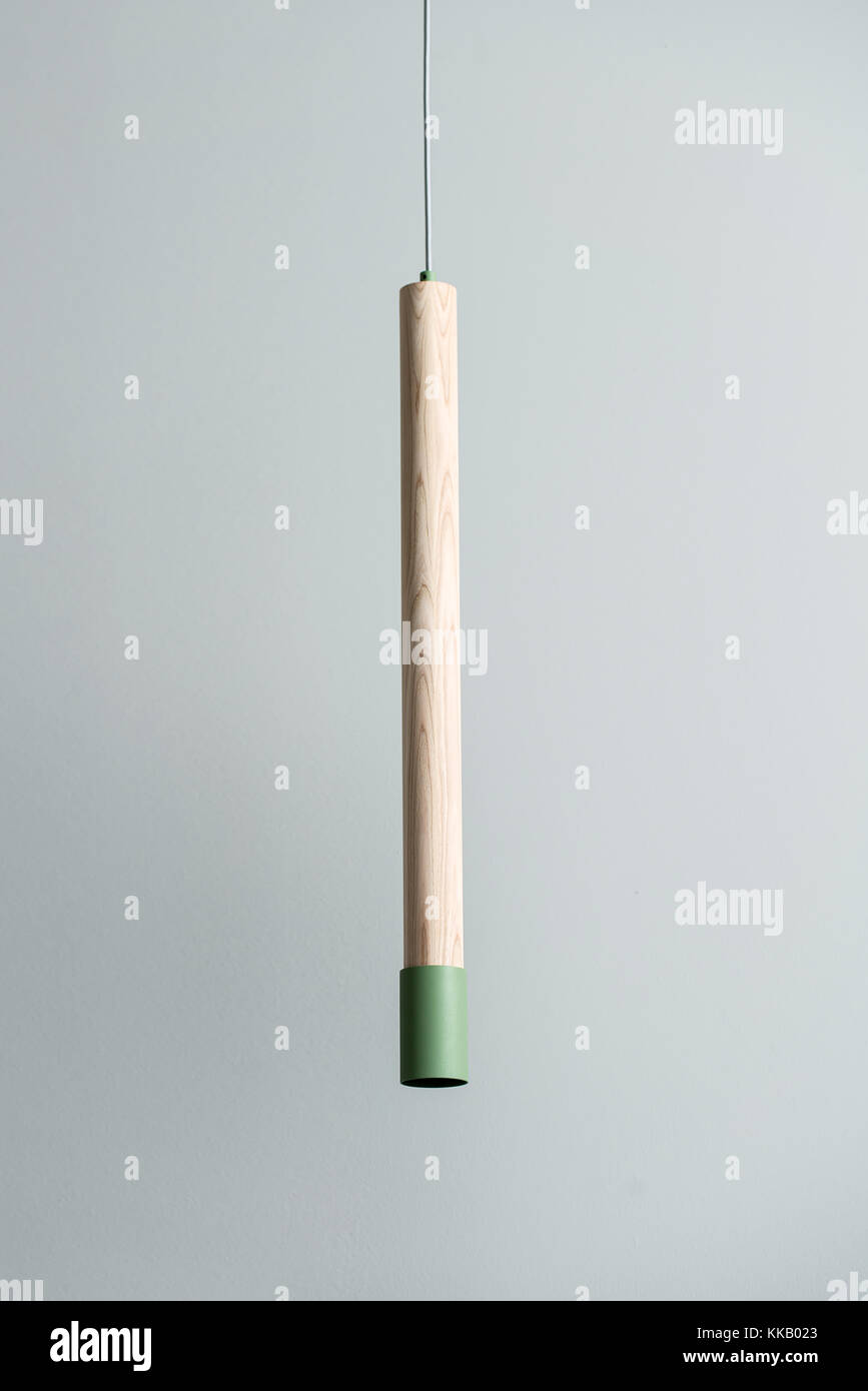 Hanging wooden tube lamp with metal part Stock Photo - Alamy