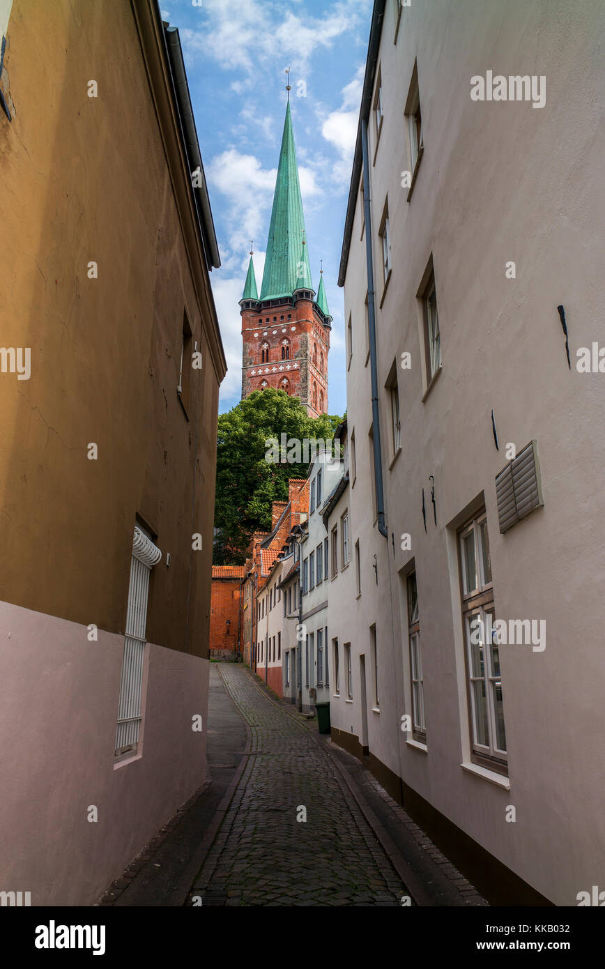 Back street and st peters church lubeck germany hi-res stock ...