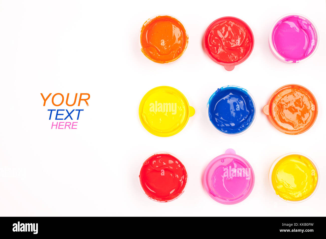 motley paints on the white background. studio shot Stock Photo - Alamy