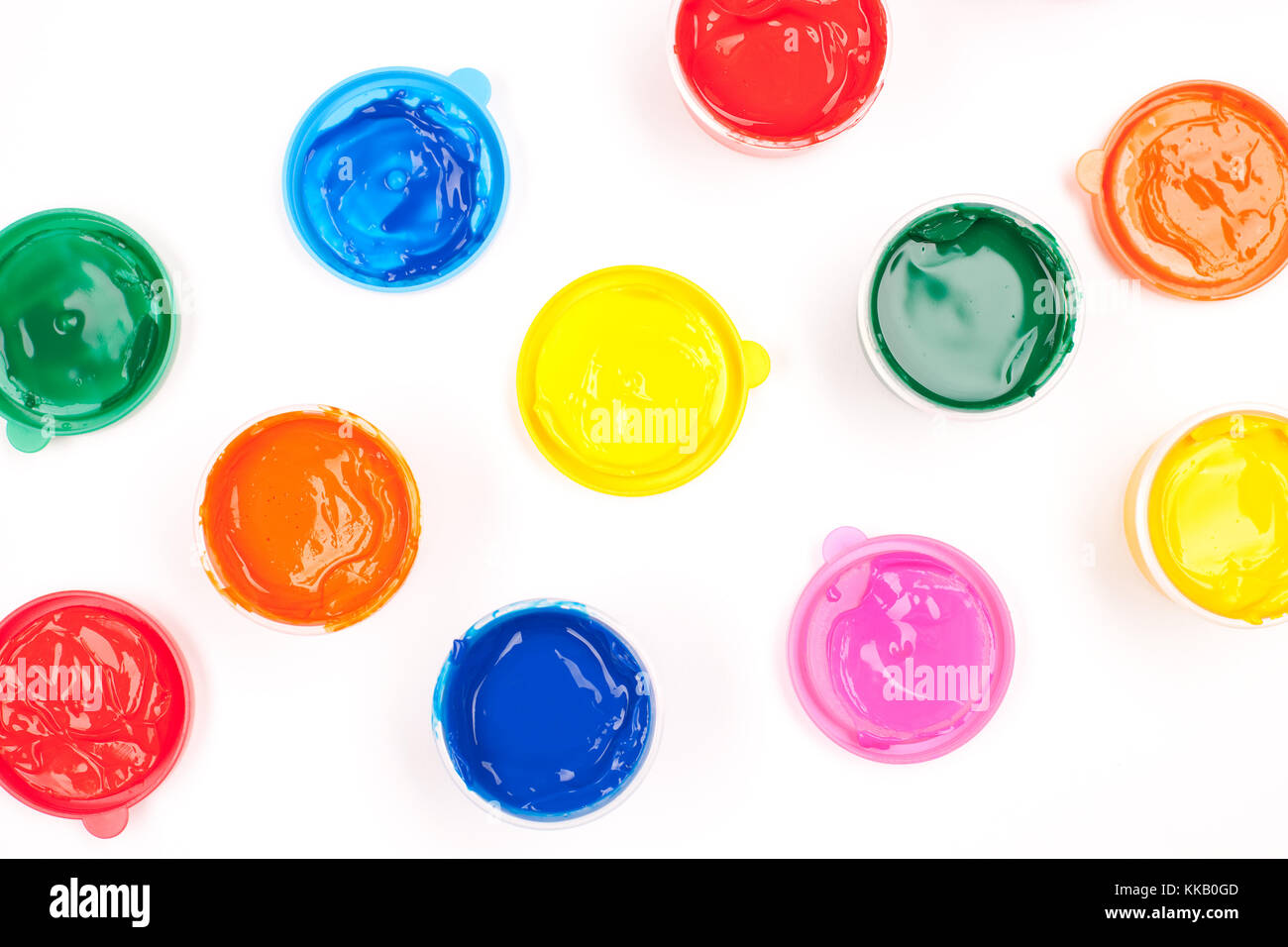 motley paints on the white background. studio shot Stock Photo - Alamy