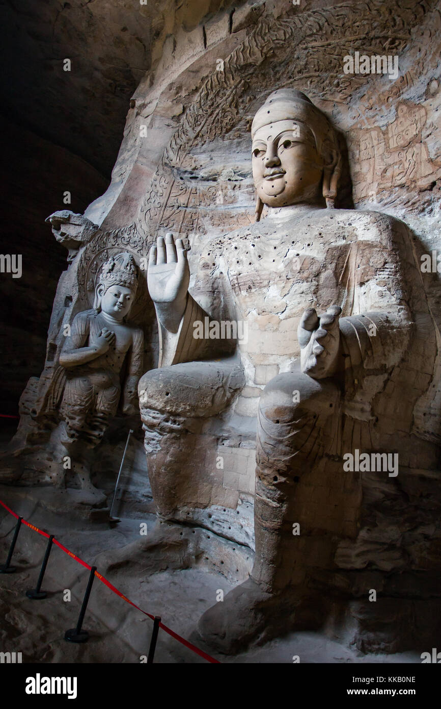 Giant stone Buddha scultpures in one of the main caves at the Yungang ...