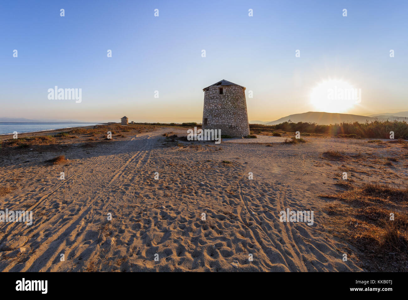 Old windmill in Gyra beach, Lefkada Greece Stock Photo - Alamy