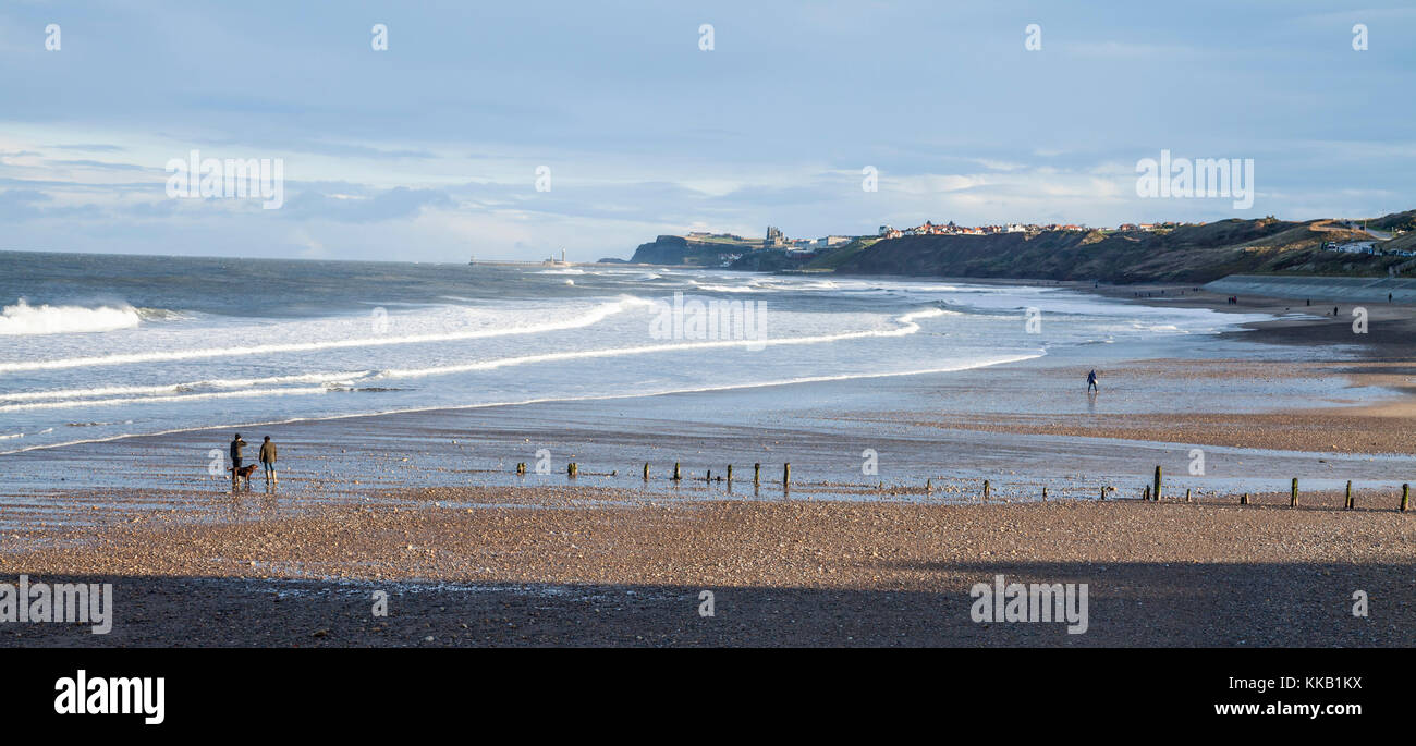 The bech at Sandsend,North Yorkshire,England,UK with Whitby in ...