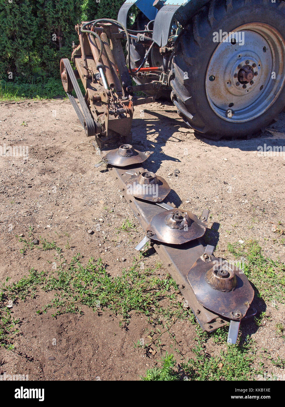 Vintage old tractor powered rotation mower on ground Stock Photo - Alamy