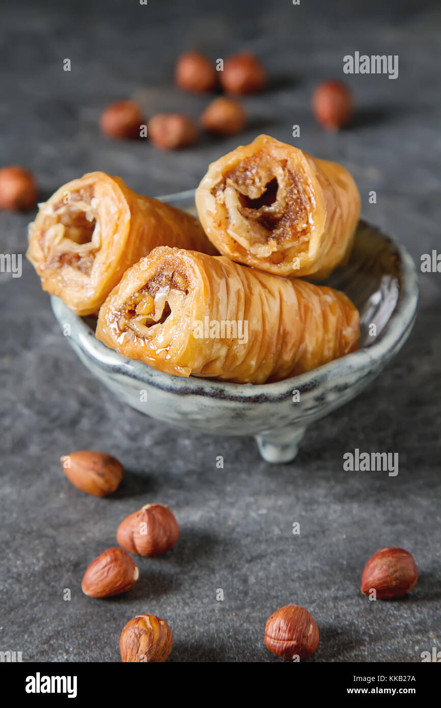 Traditional eastern arabic dessert Baklava with Turkish honey and ...