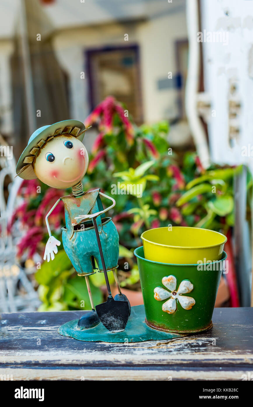Boy doll shaped flower pot Stock Photo - Alamy
