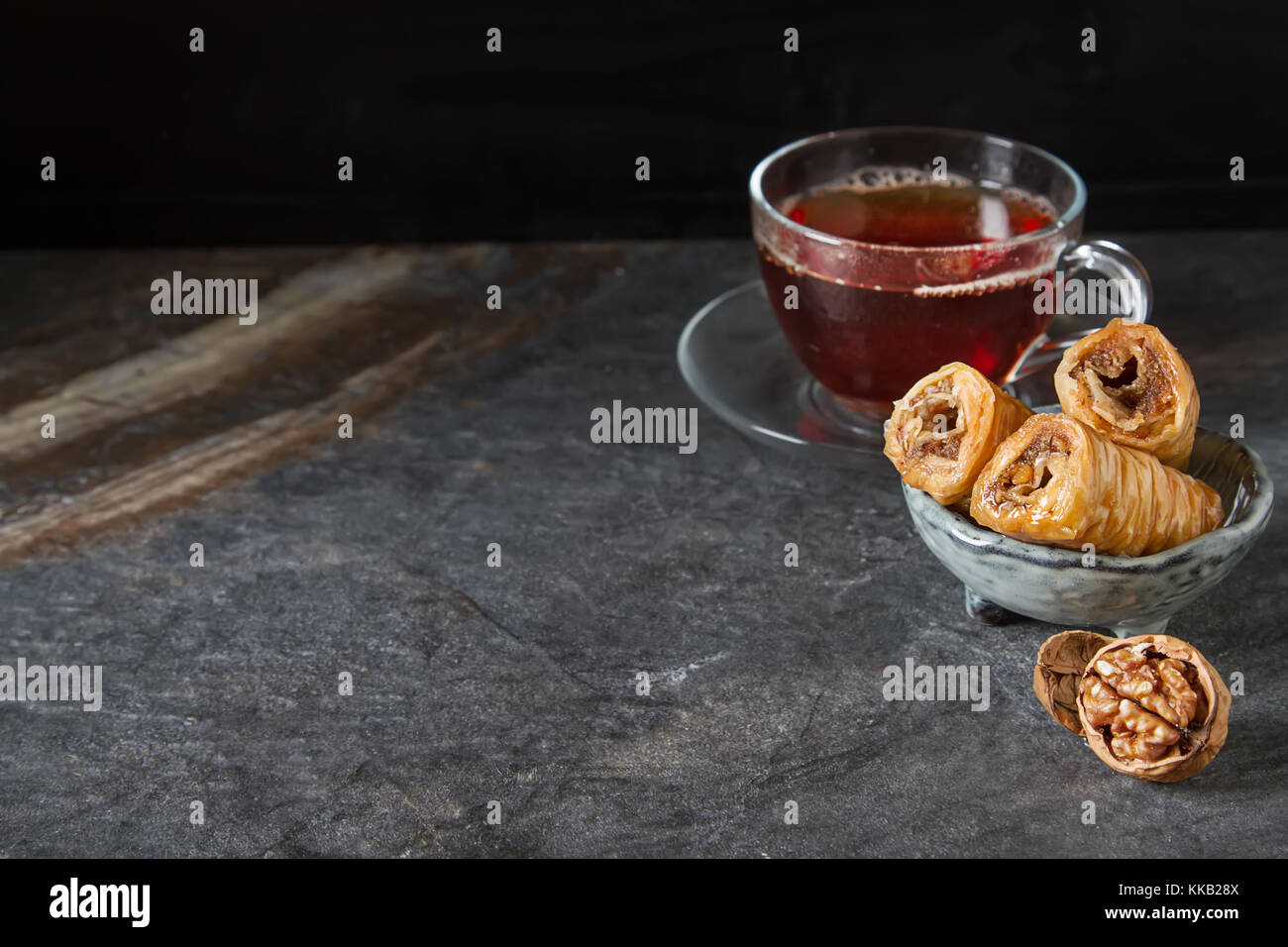 Traditional eastern arabic dessert Baklava with Turkish honey and ...
