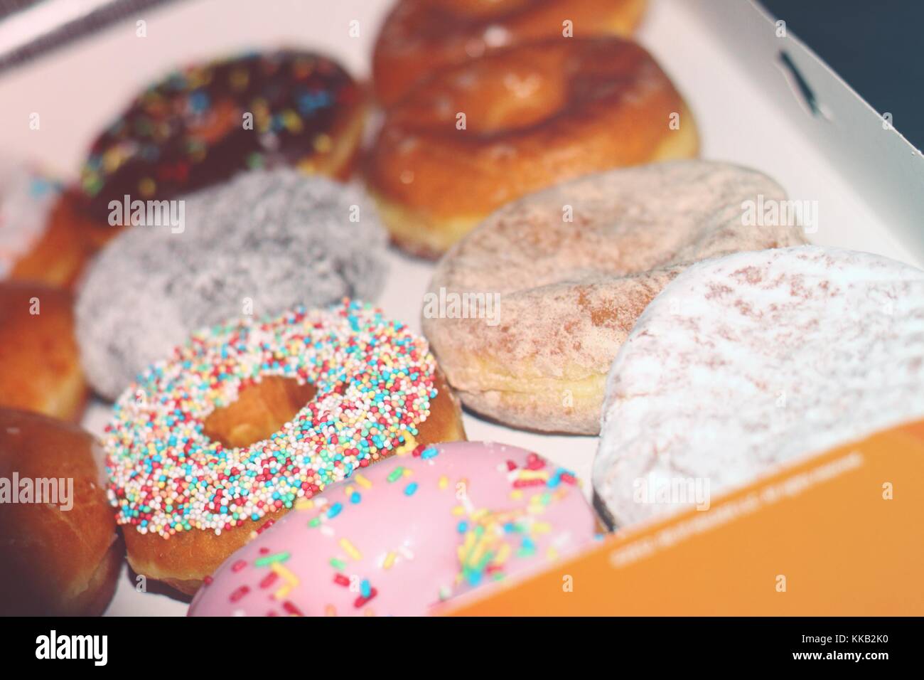Tasty donuts being tasty Stock Photo - Alamy