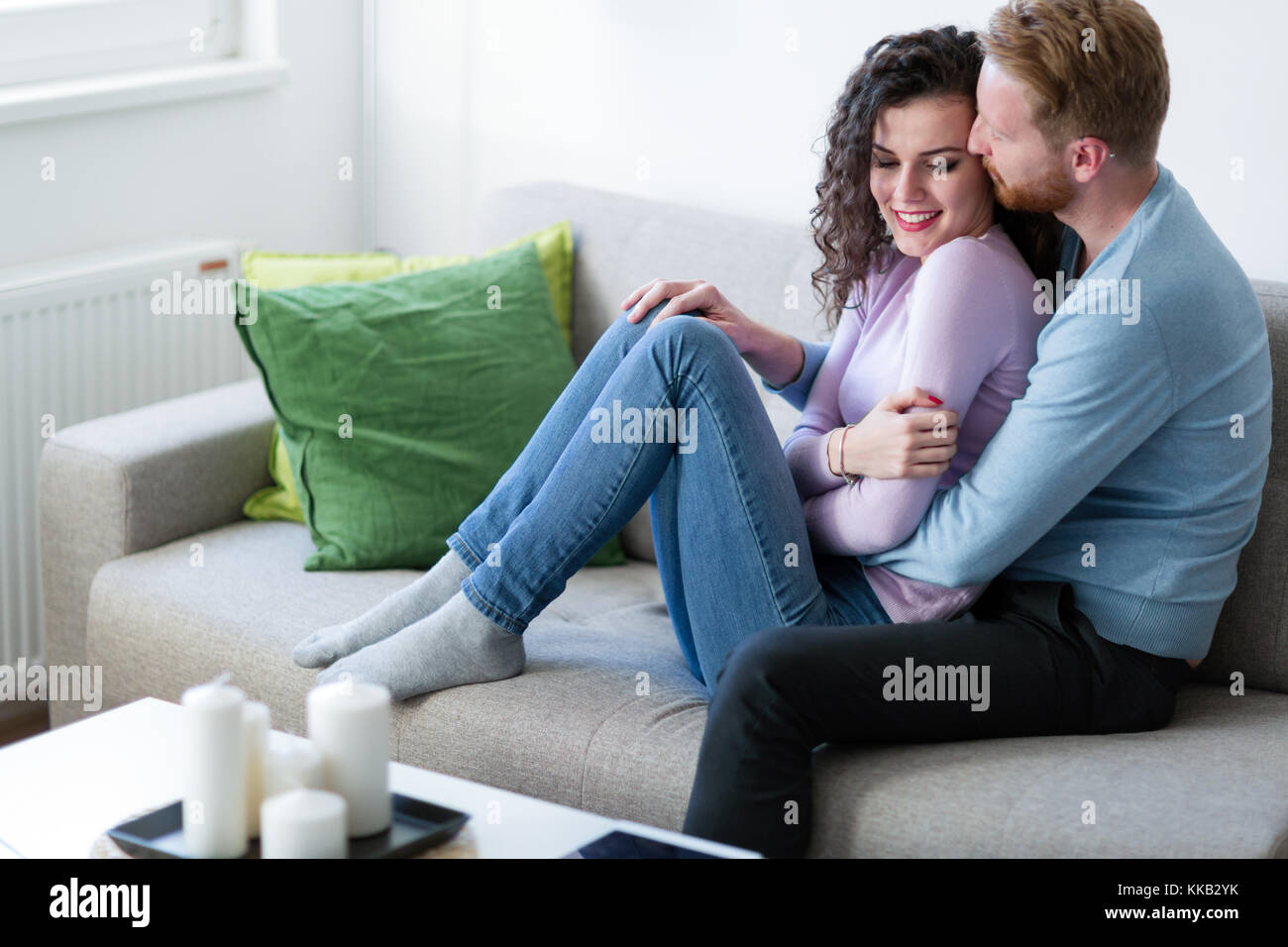 Happy couple having romantic moments at home Stock Photo - Alamy