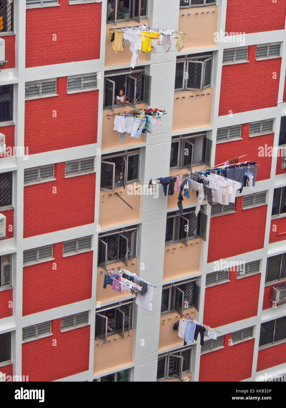 Migrant domestic worker cleaning apartments in Singapore Stock Photo ...