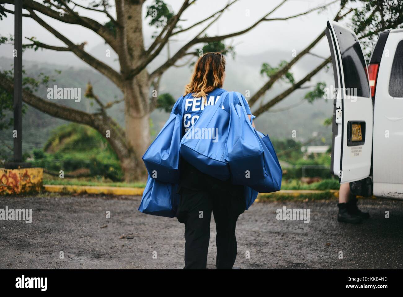 FEMA and AmeriCorps volunteers pack emergency supplies for Puerto Rican ...