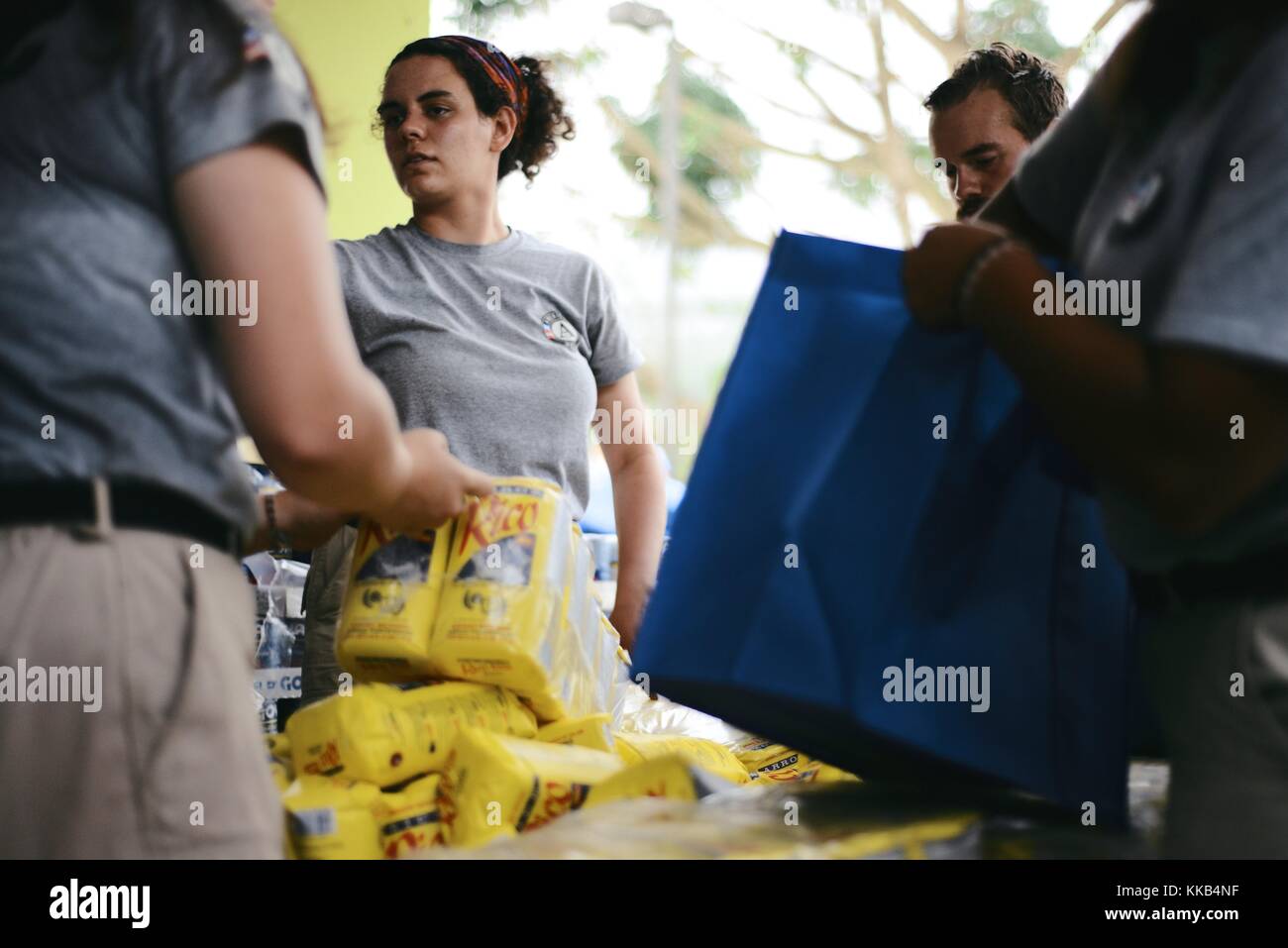 FEMA and AmeriCorps volunteers pack emergency supplies for Puerto Rican ...