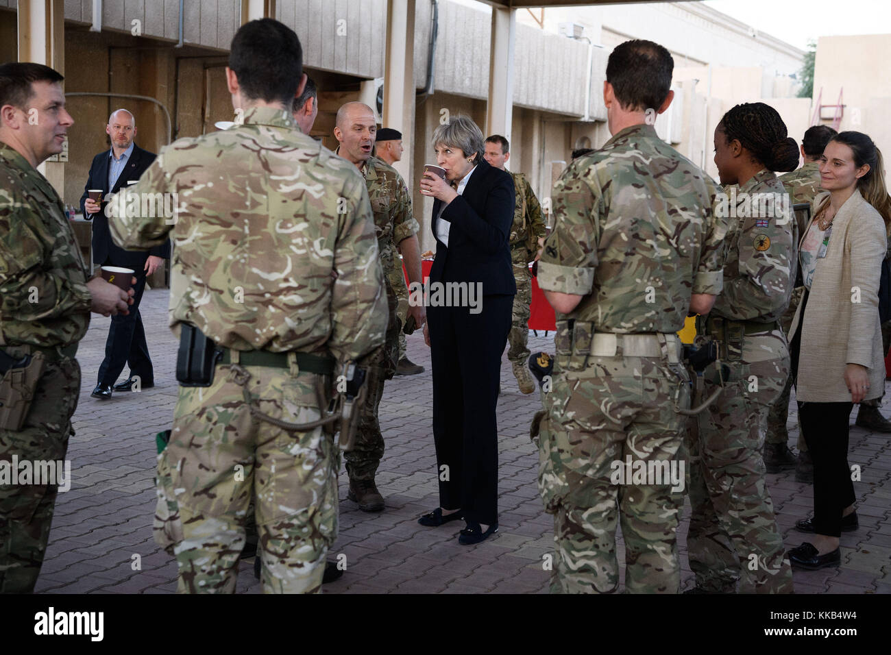 Prime Minister Theresa May speaks with soldiers at the Combined Joint ...