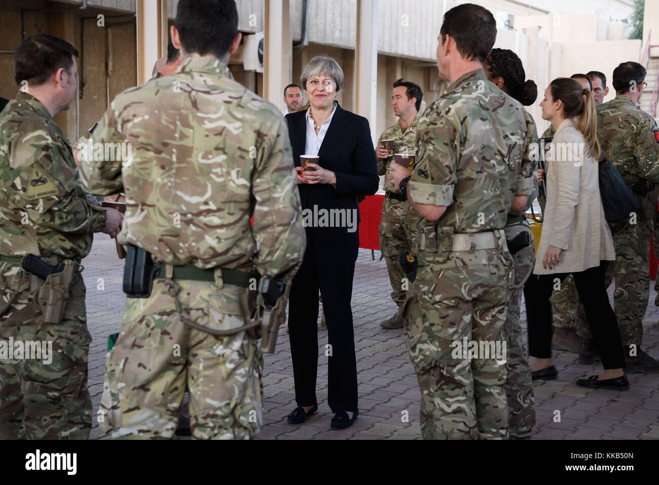 Prime Minister Theresa May speaks with soldiers at the Combined Joint ...