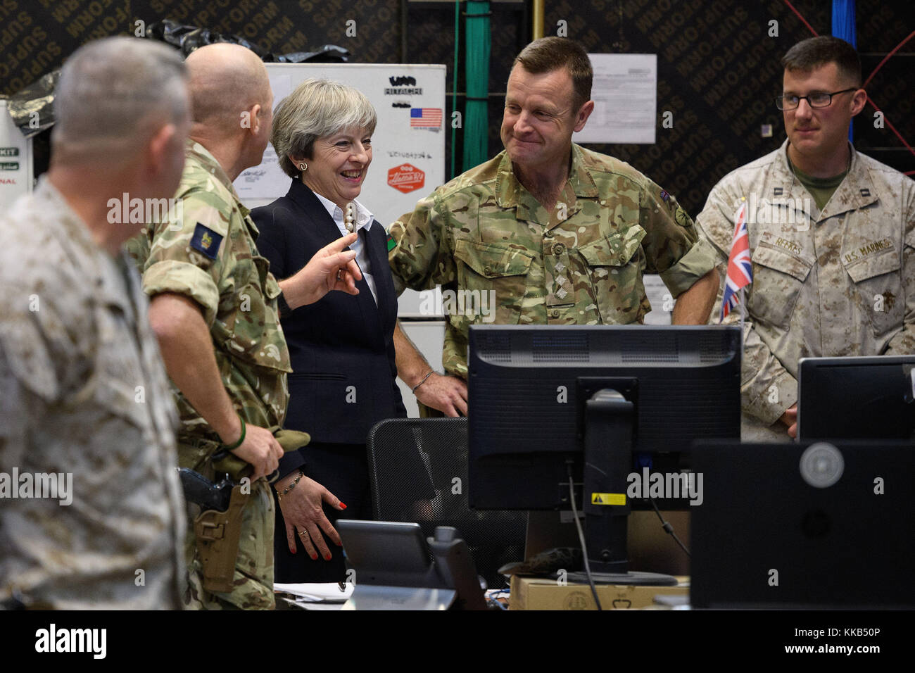 Prime Minister Theresa May speaks with soldiers at the Combined Joint ...