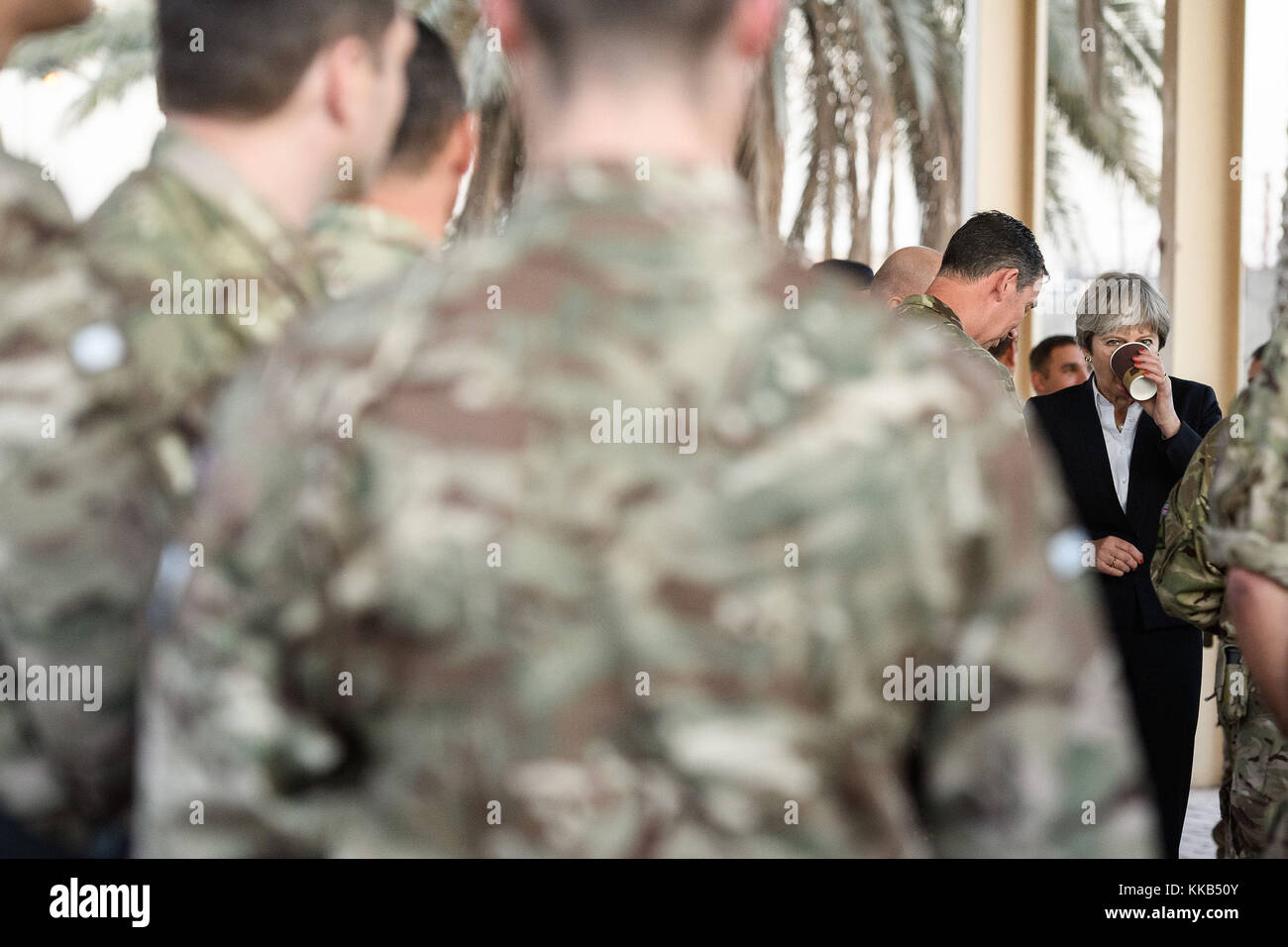 Prime Minister Theresa May speaks with soldiers at the Combined Joint ...