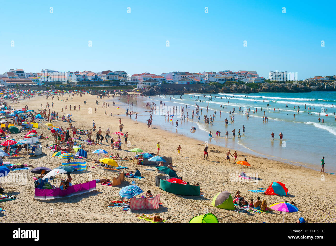 BALEAL, PORTUGAL - JUL 30, 2017: Crowded ocean beach in a high peak ...