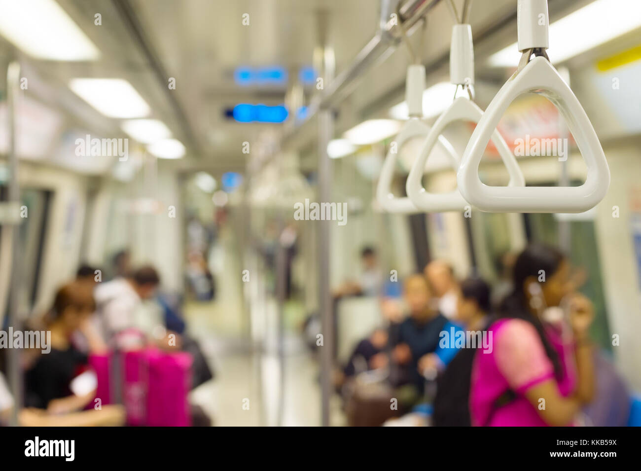 Inside the Singapore metro train. Focus on a handrail Stock Photo - Alamy