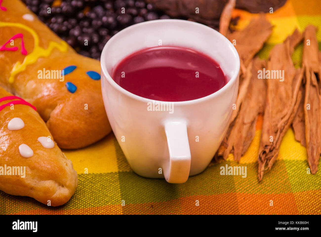 Close up of traditional Ecuadorian dish, colada morada and differente ...