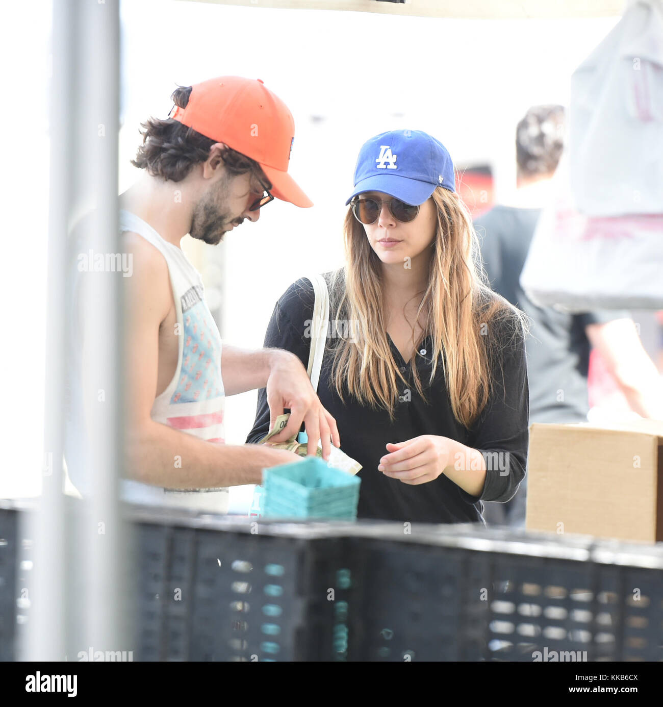Elizabeth Olsen goes to the Farmers Market with her boyfriend Robbie ...