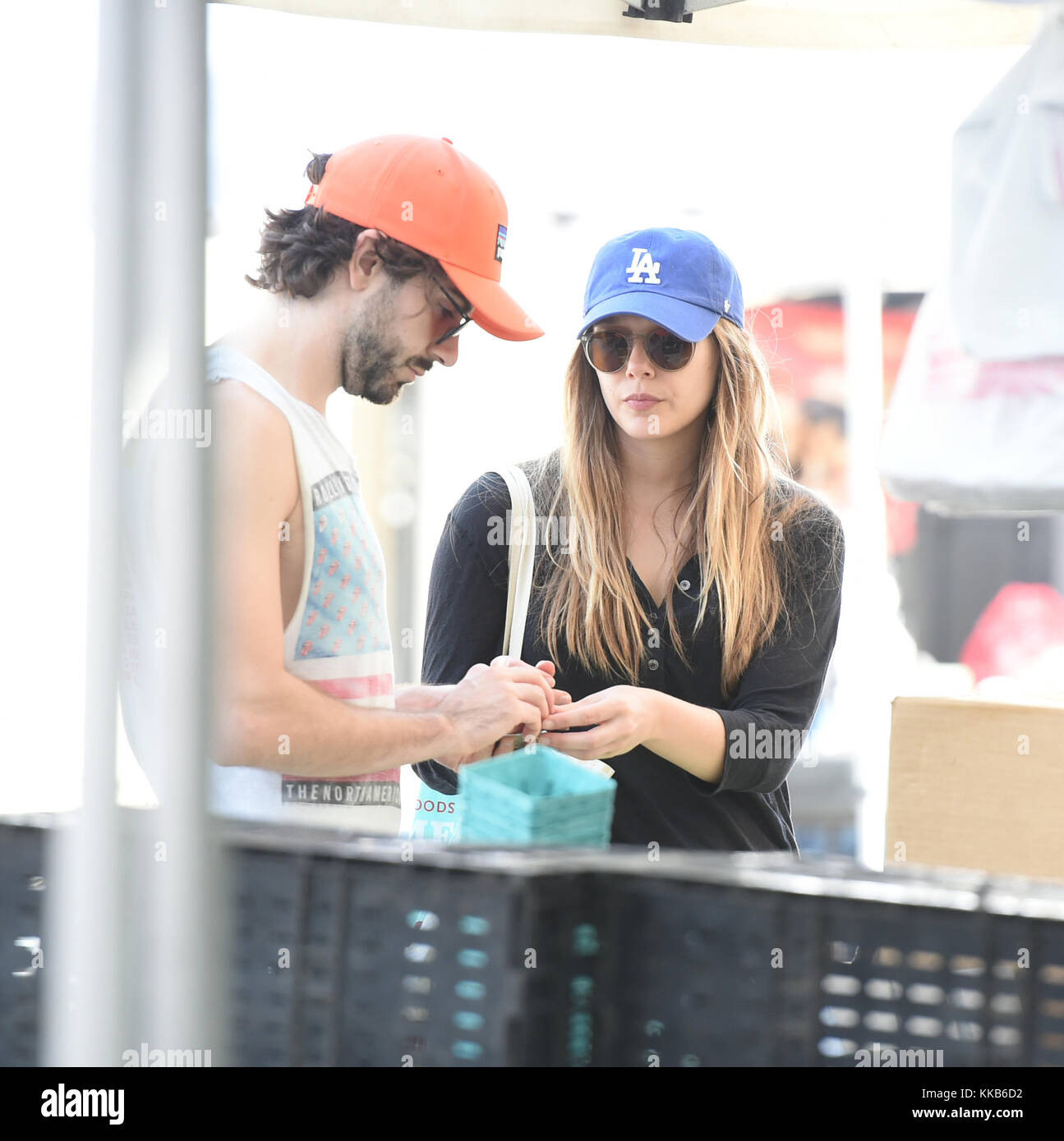 Elizabeth Olsen goes to the Farmers Market with her boyfriend Robbie ...