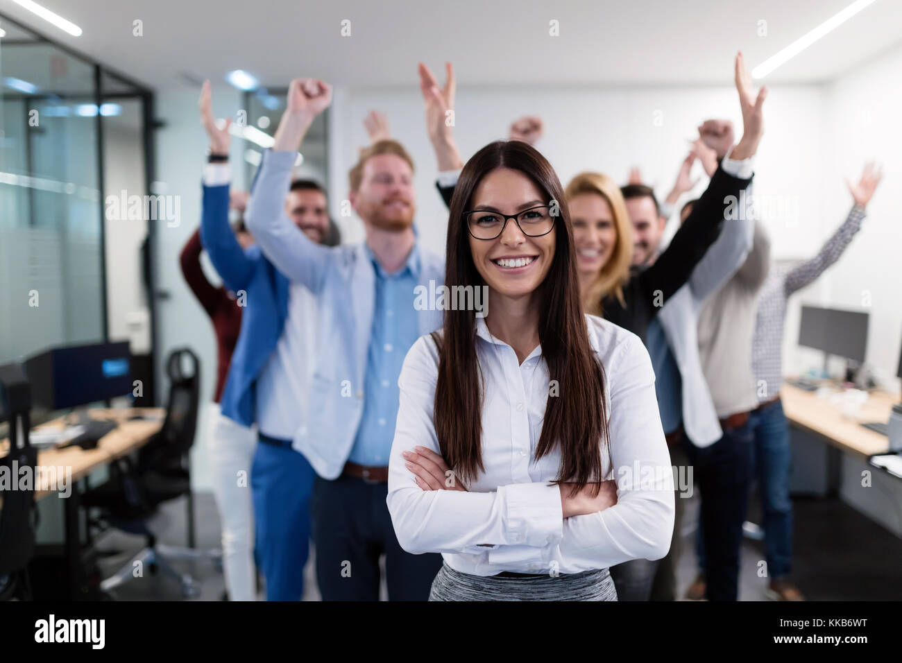 Group picture of business team posing in office Stock Photo - Alamy