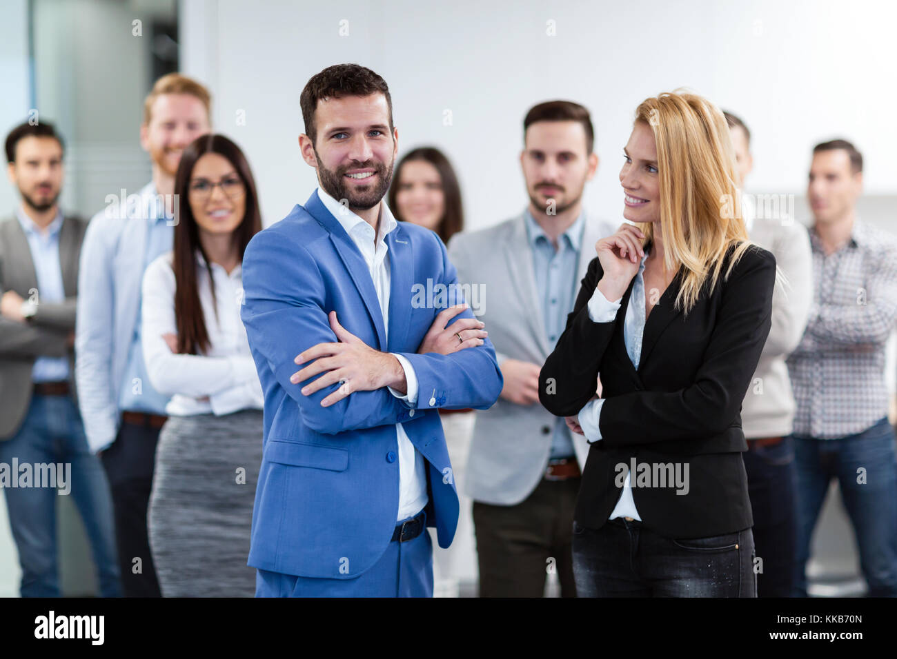 Group picture of business team posing in office Stock Photo - Alamy