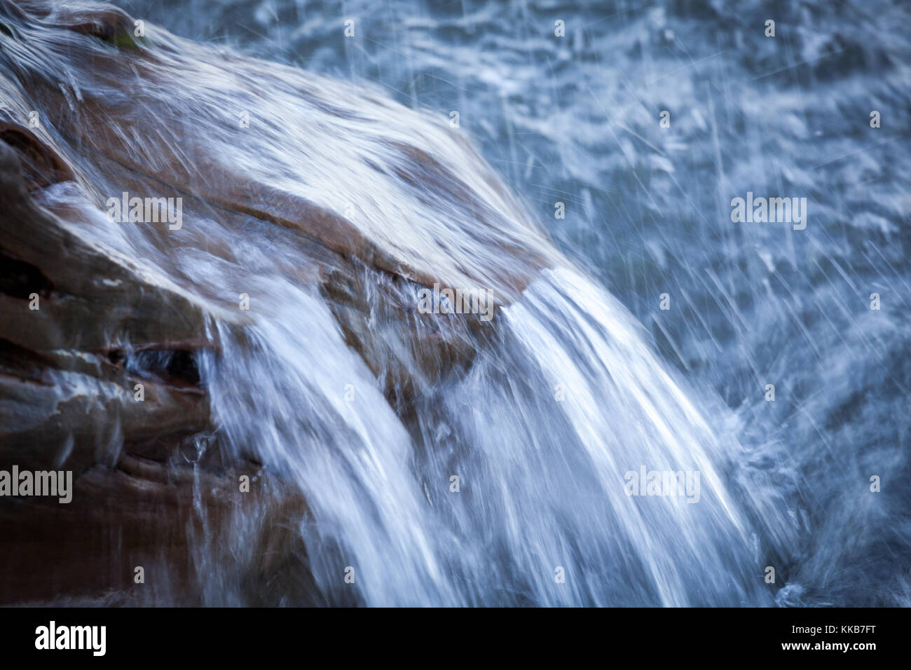 moving water over rocks Stock Photo - Alamy