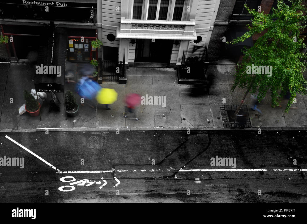 View from window at MoMA looking down at a rainy sidewalk on West 54th ...