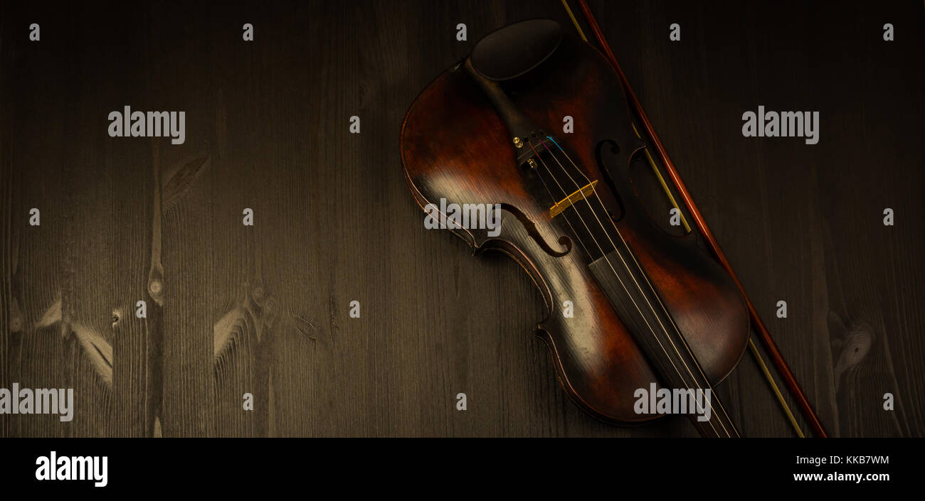 Violin in vintage style on wood background with copy space Stock Photo ...