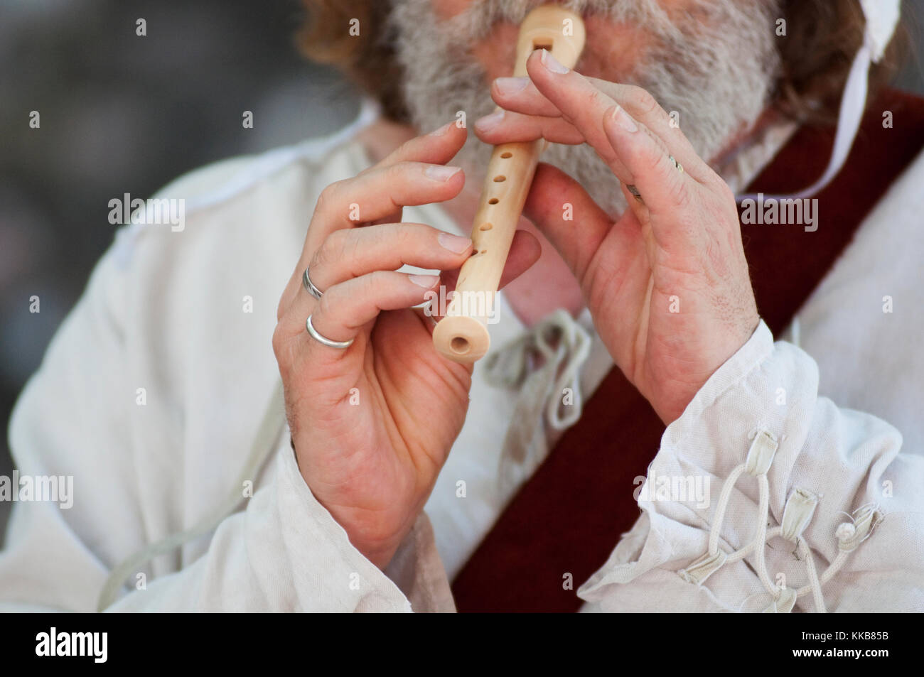 Old man playing flute hi-res stock photography and images - Alamy