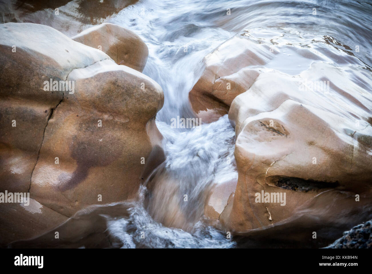 moving water over rocks Stock Photo - Alamy