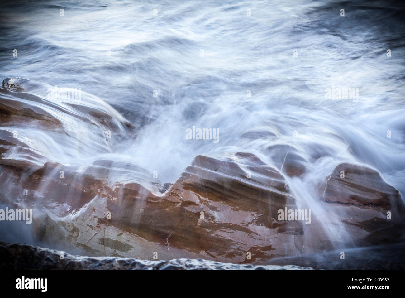 moving water over rocks Stock Photo - Alamy