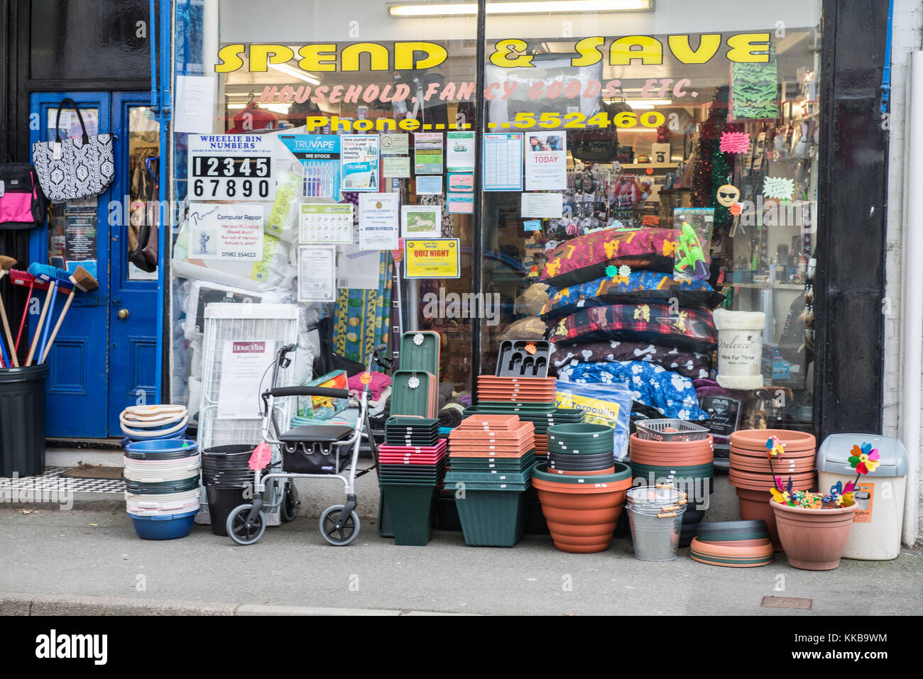 Pavement display of objects for sale at an Ironmongery and household ...