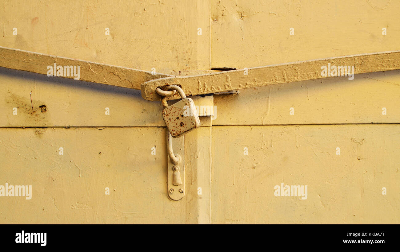 Sturdy iron lock keeps doors closed Stock Photo - Alamy
