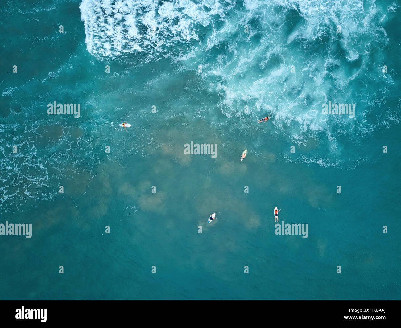 Surfers catching big wave above drone view. Surfer wait for wave Stock ...