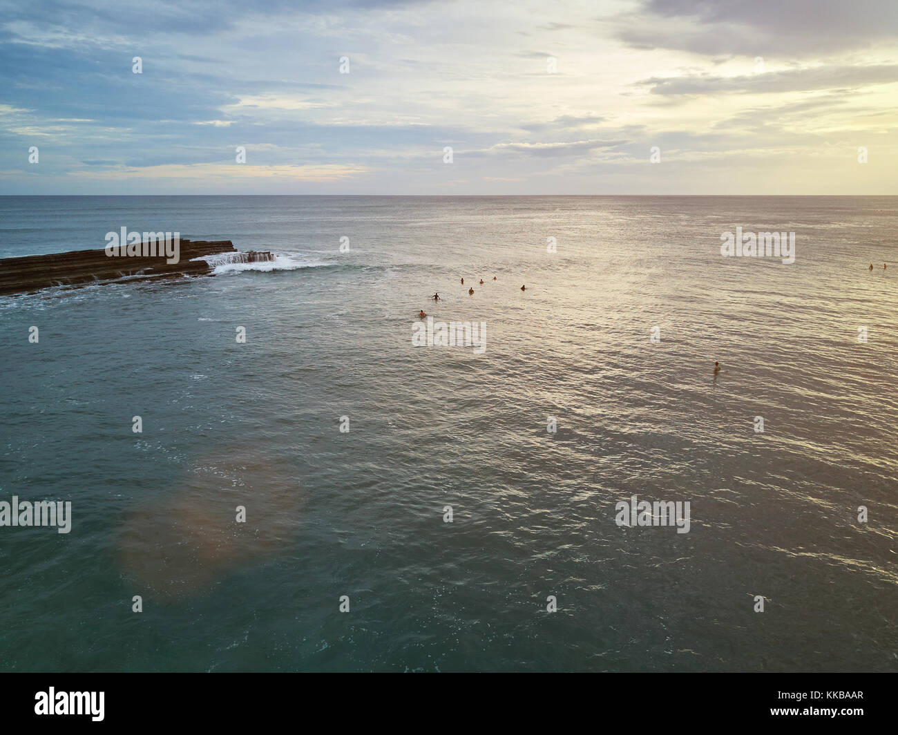 Surfers in Pacific ocean Nicaragua. Magnific rock surf place in ...