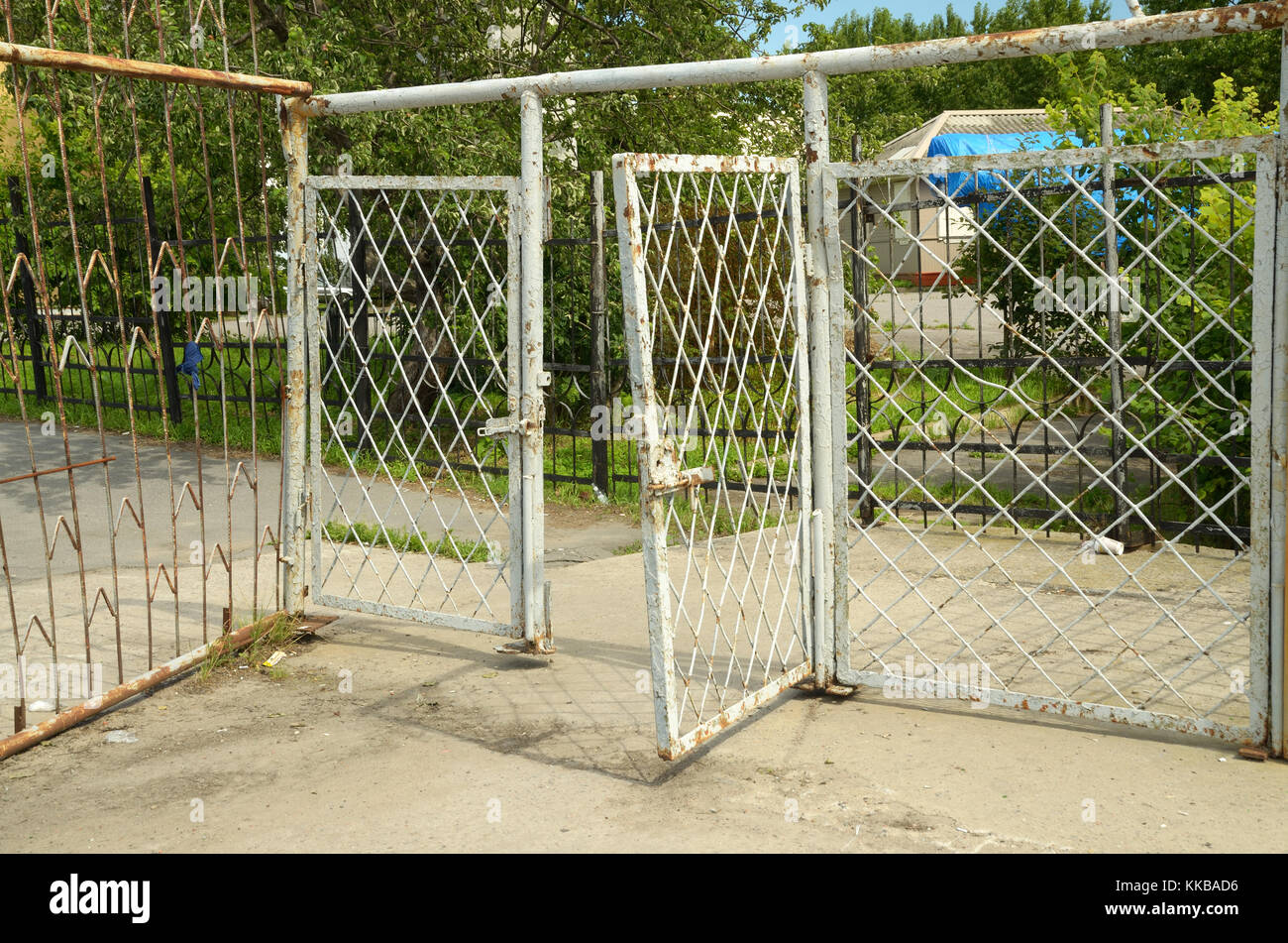 Metal fence at the entrance to the beach.You can go through the doors ...