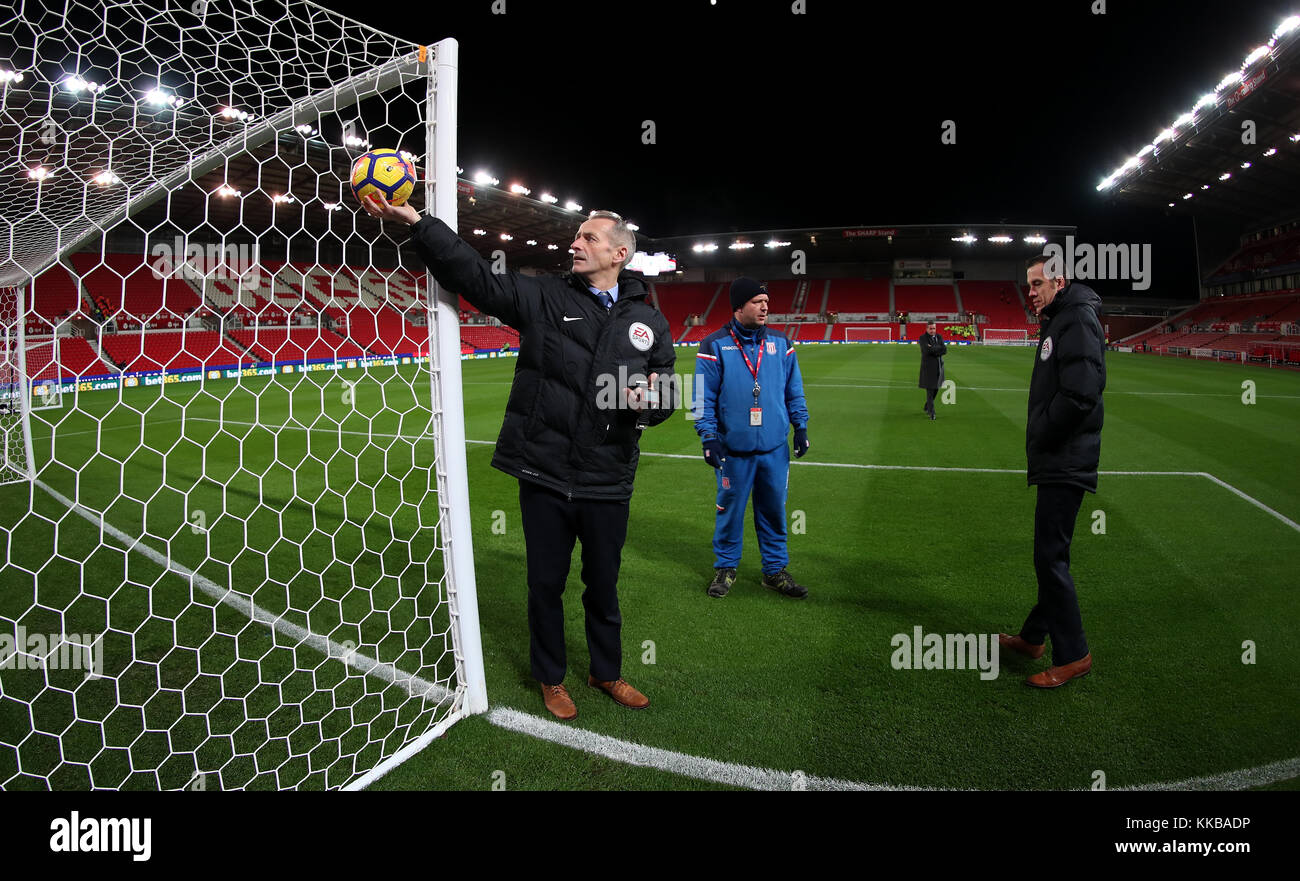 Referee Martin Atkinson tests the goal line technology before the ...