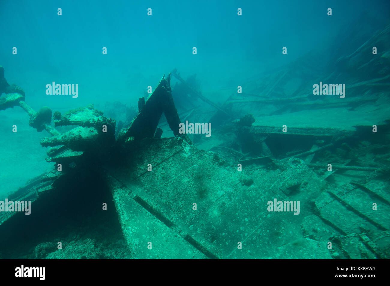 Rusty metal of shipwreck on bottom of blue caribbean sea water Stock ...