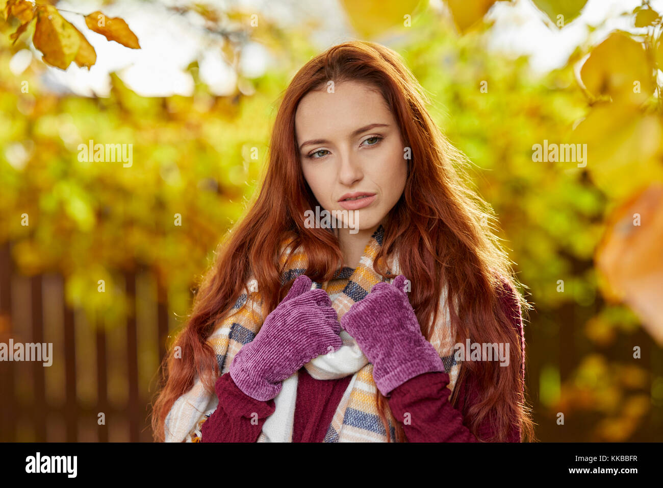 Girl looking concerned outdoors Stock Photo - Alamy